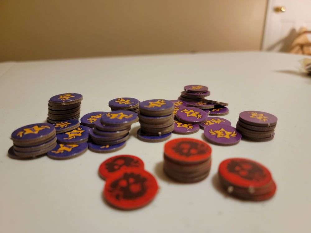 Edge painting board game tokens
