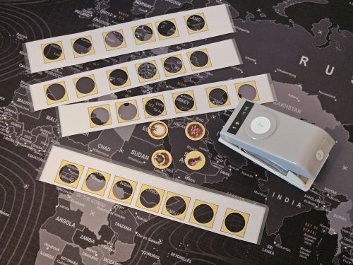 Custom tokens with metal washers and laminated sticker paper