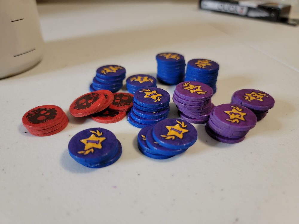 Edge painting board game tokens