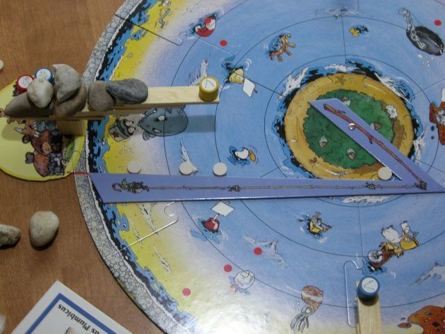 Board game where you built physical "bridges" to fish for resources ...
